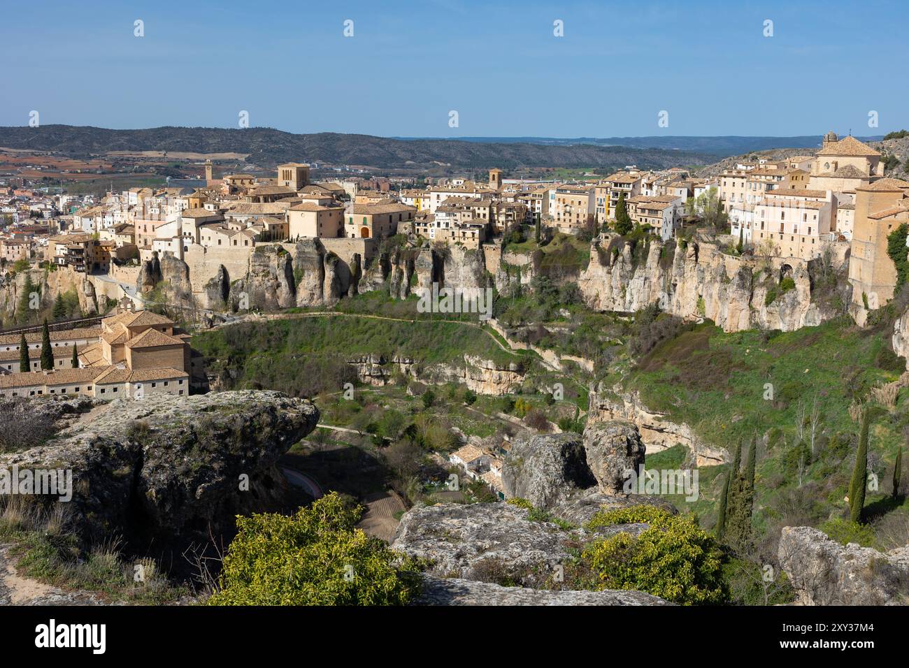 Old part of Cuenca city on rocks with hanging houses on spring day ...