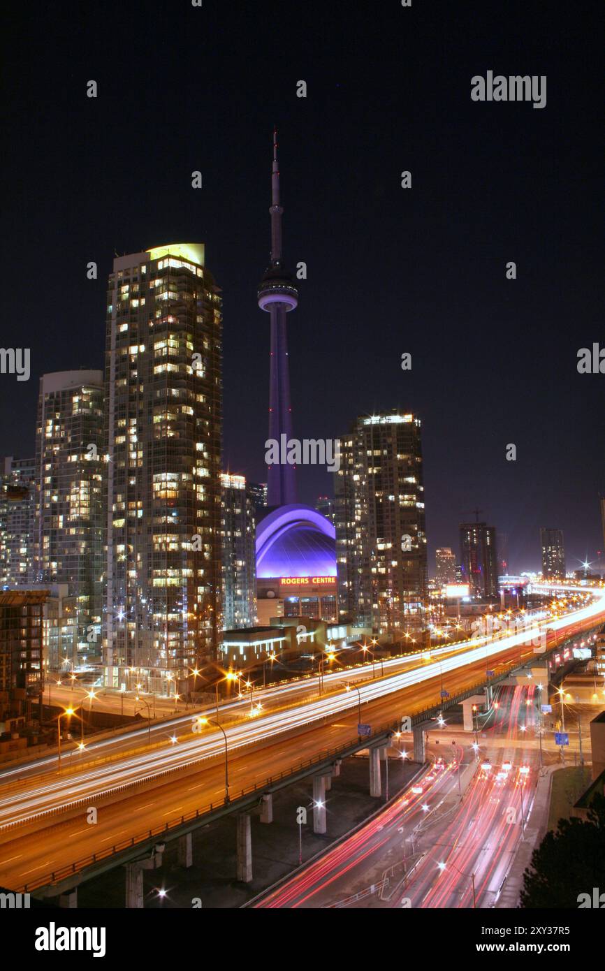 An illuminated Toronto skyline at night with the CN Tower, Rogers ...