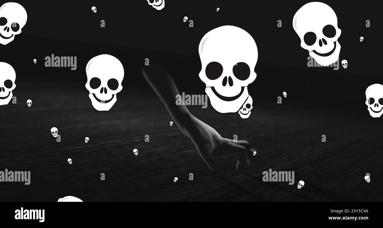 Image of skulls falling over hand walking in black space Stock Photo ...