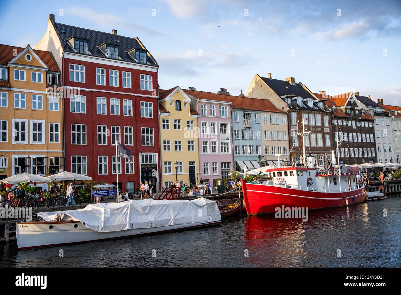 Copenhagen, Denmark - July 25, 2024: Colourful, captivating Nyhavn is ...