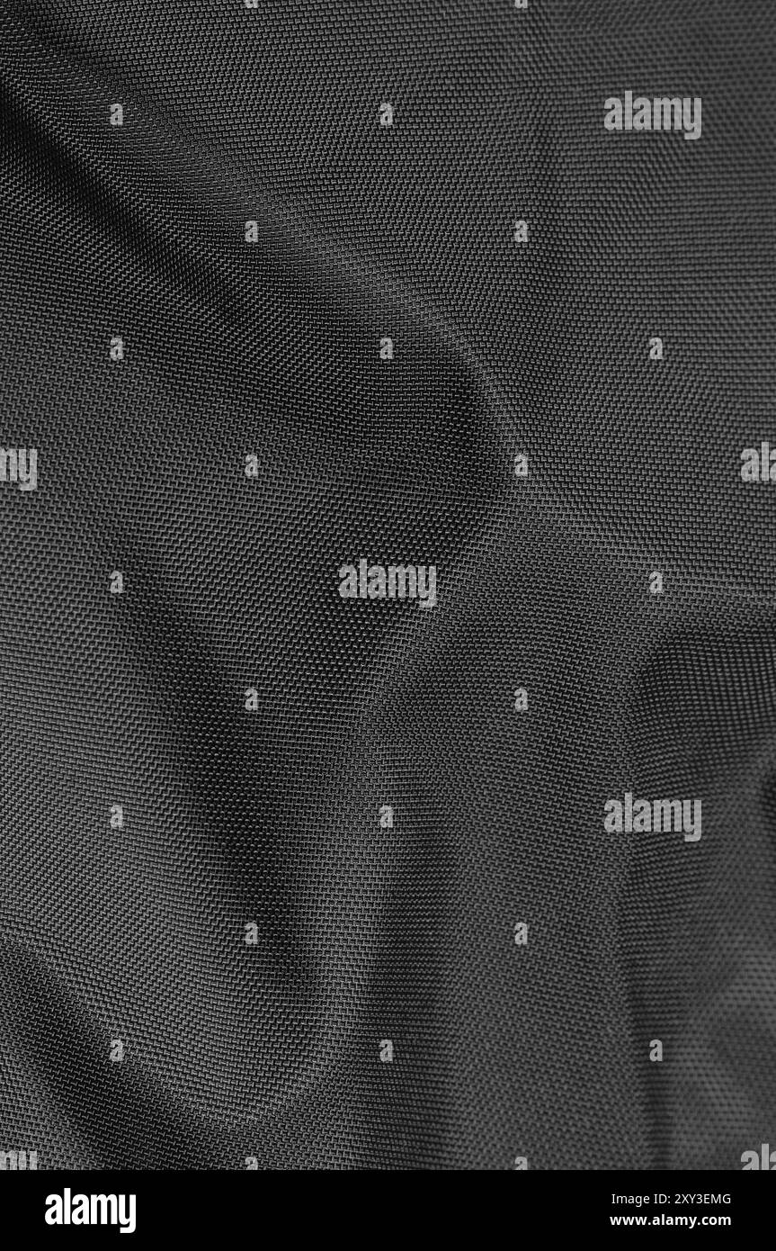 Black crumpled natural nylon fabric texture pattern detail, large ...