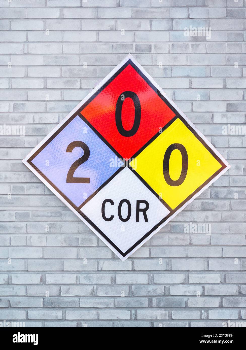 Diamond shaped NFPA panel identifying hazardous chemicals inside fenced in area Stock Photo - Alamy