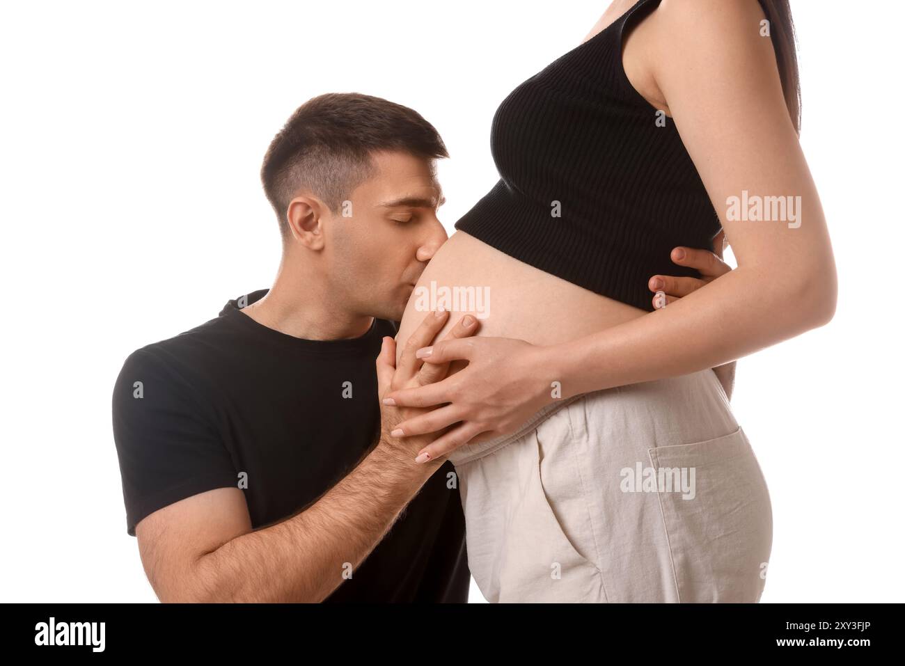 Pregnant woman kissing husband isolated hi-res stock photography and ...