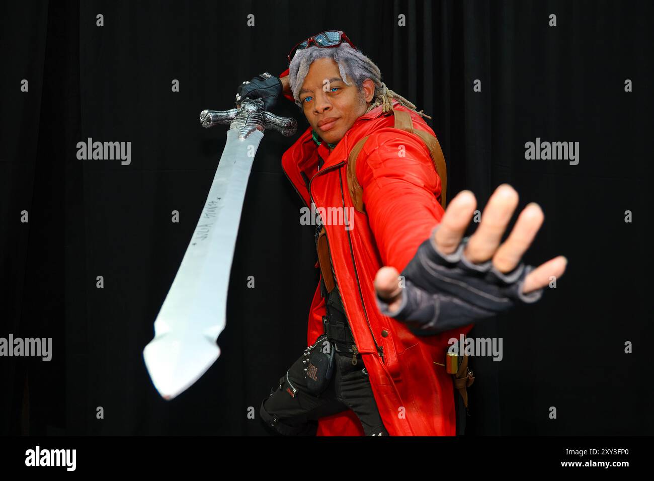 Cosplayer Mark Graham is in costume as Dante from Devil May Cry 3 at ...