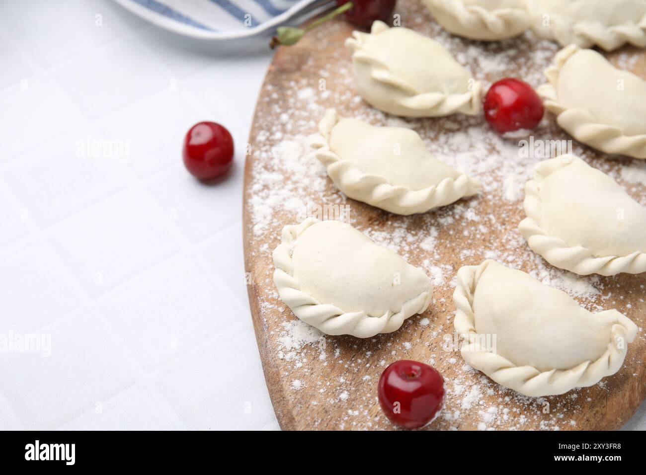 Raw dumplings varenyky cherries hi-res stock photography and images - Alamy