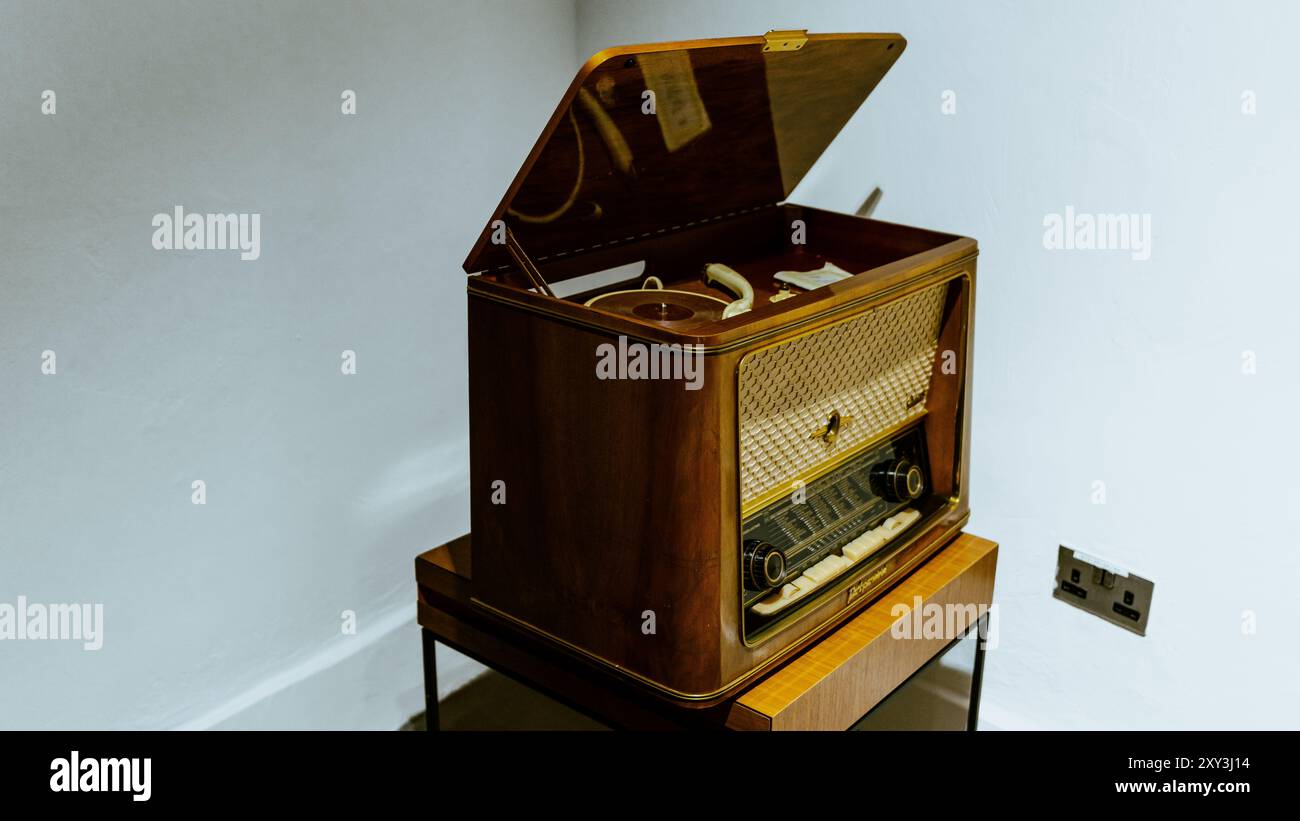 Vintage radio receiver on table in room. High quality photo Stock Photo ...