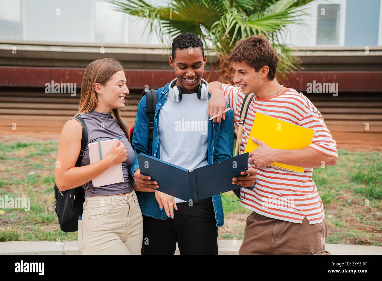 Two teenagers holding test hi-res stock photography and images - Alamy