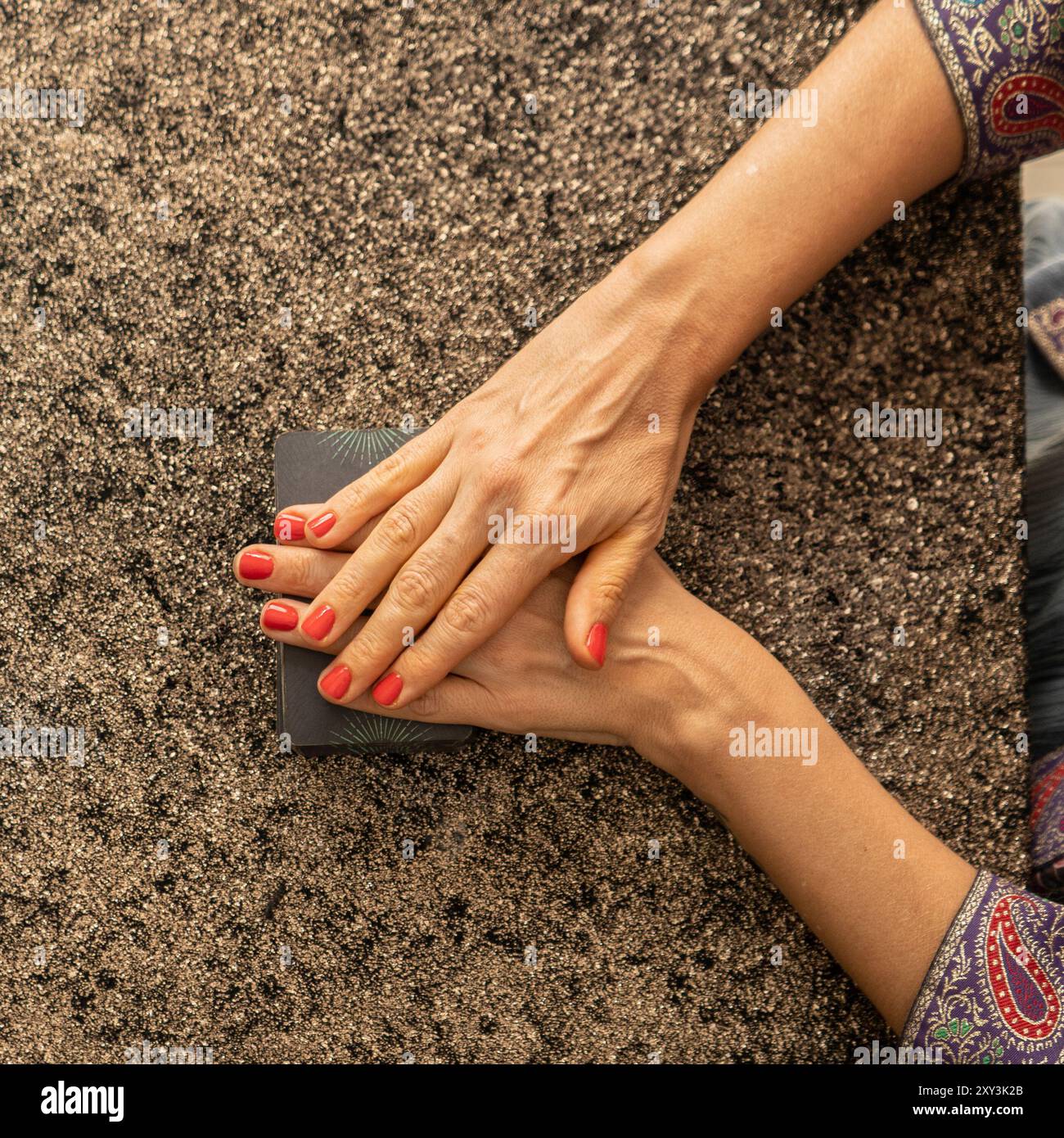 Top view of a tarot reader's hands over the tarot deck Stock Photo - Alamy