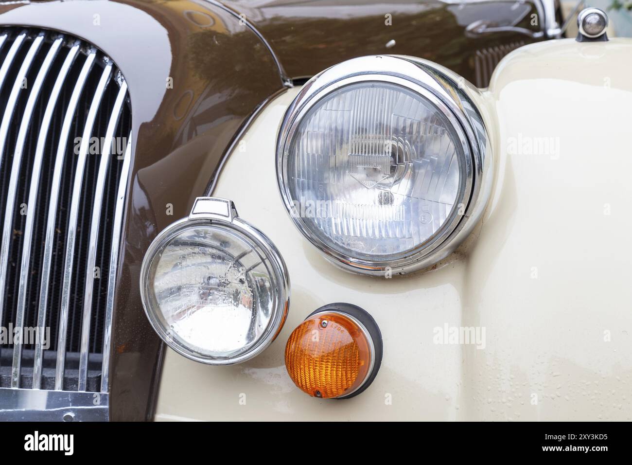 Headlights, indicators and radiator grille of a British sports car from ...