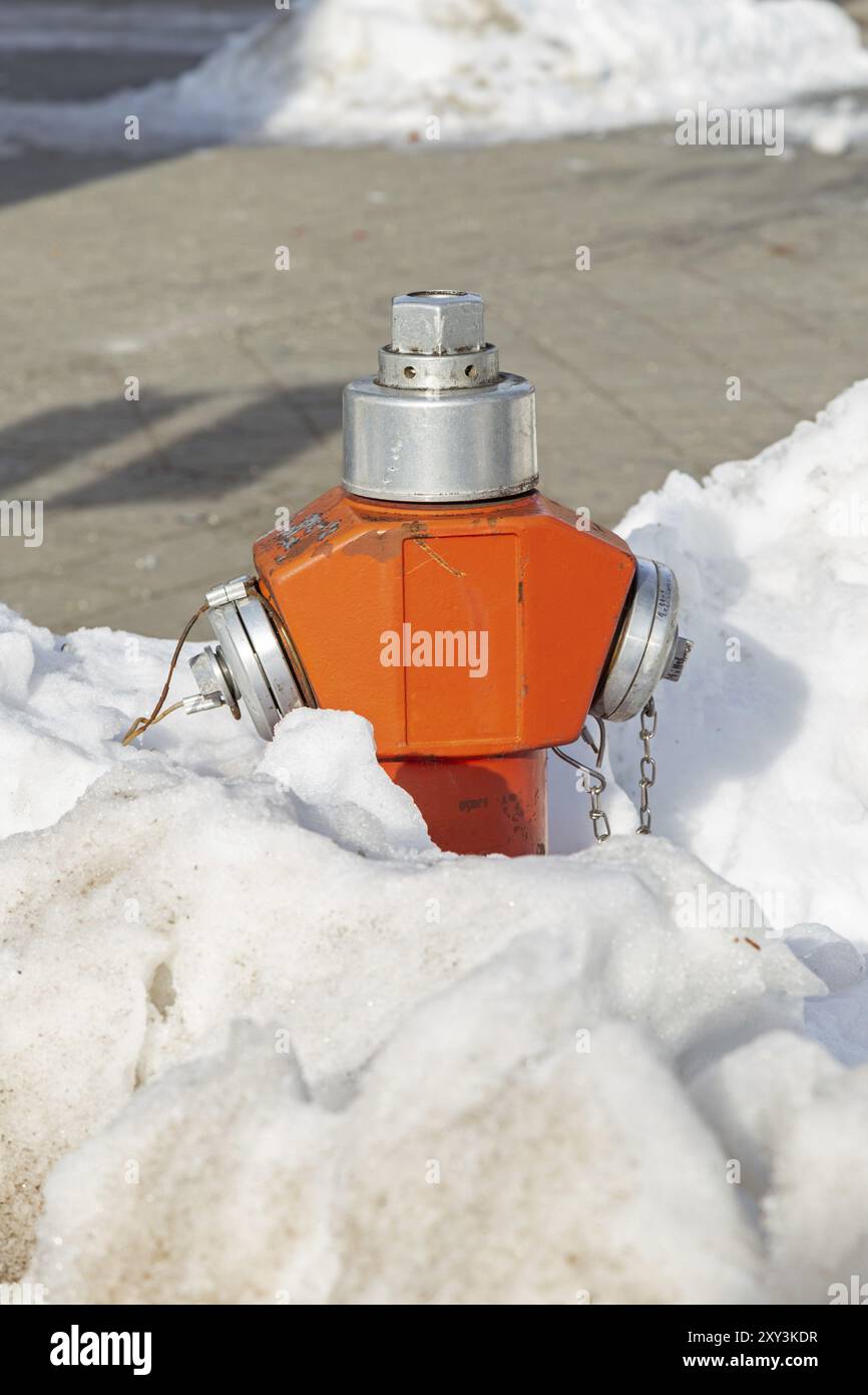 Snowed-in hydrant on a road Stock Photo - Alamy