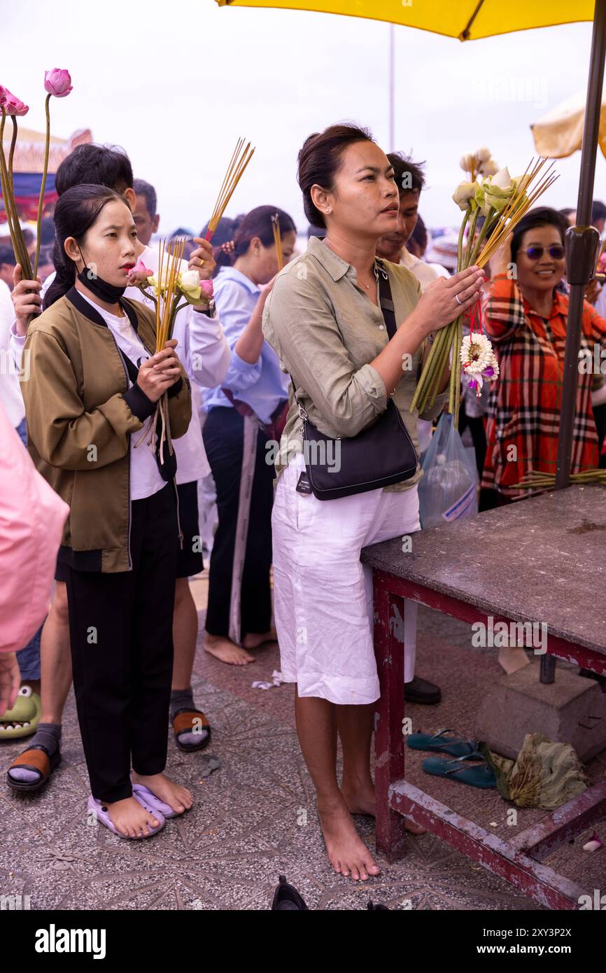 Visitors praying at Lok Ta Dombong Dek, Lok Ta Krohom Ko and Lokta ...