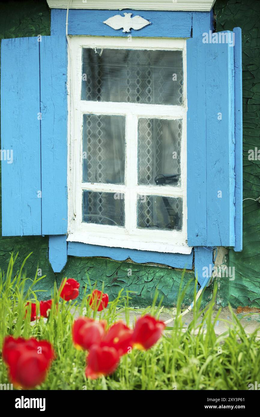 Window of old house and spring flowers Stock Photo - Alamy