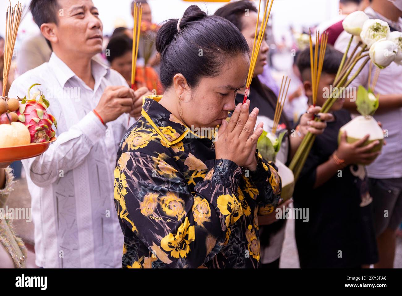 Visitors praying at Lok Ta Dombong Dek, Lok Ta Krohom Ko and Lokta ...