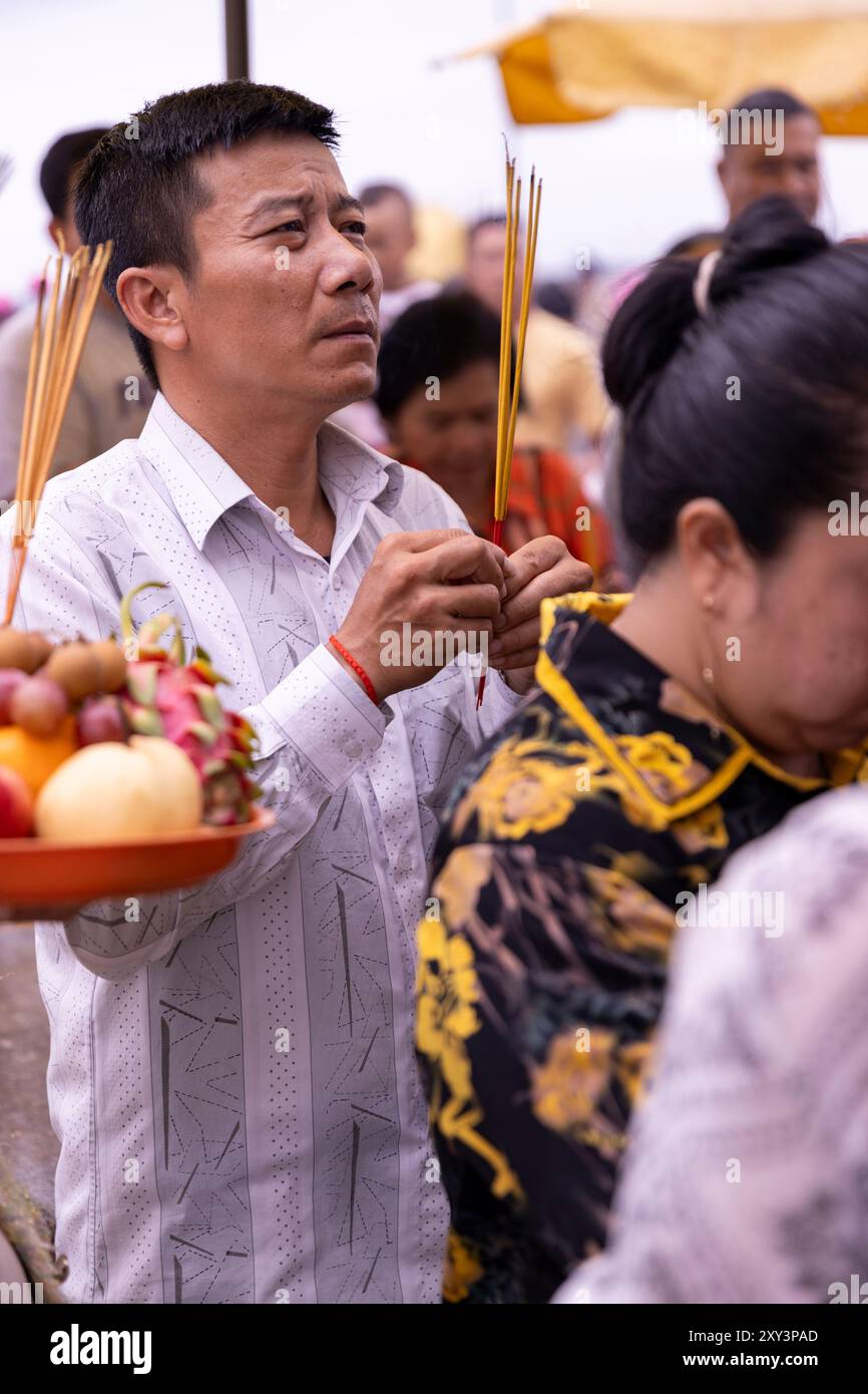 Visitors praying at Lok Ta Dombong Dek, Lok Ta Krohom Ko and Lokta ...