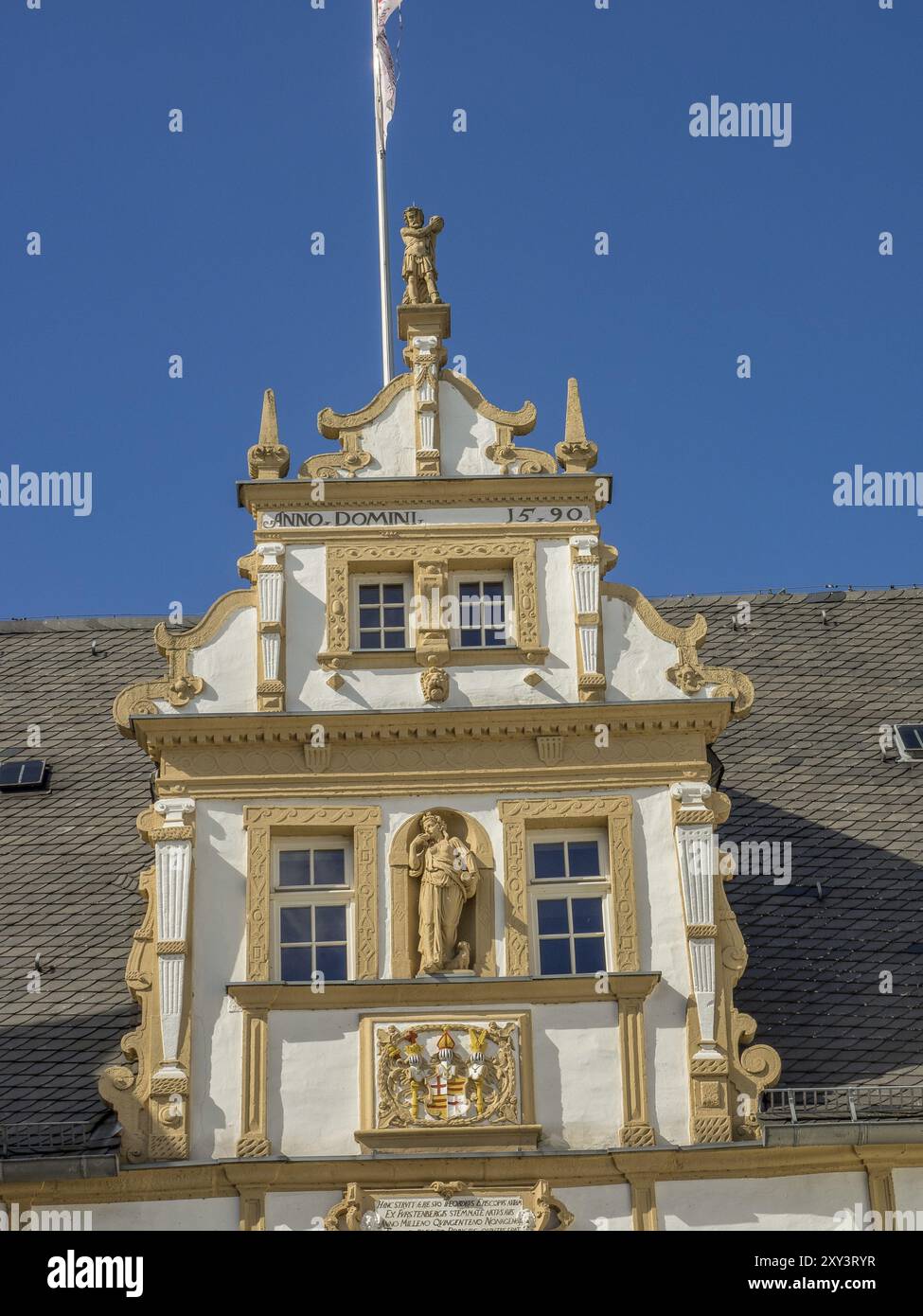 Magnificent Renaissance facade of a castle with statues and decorations ...