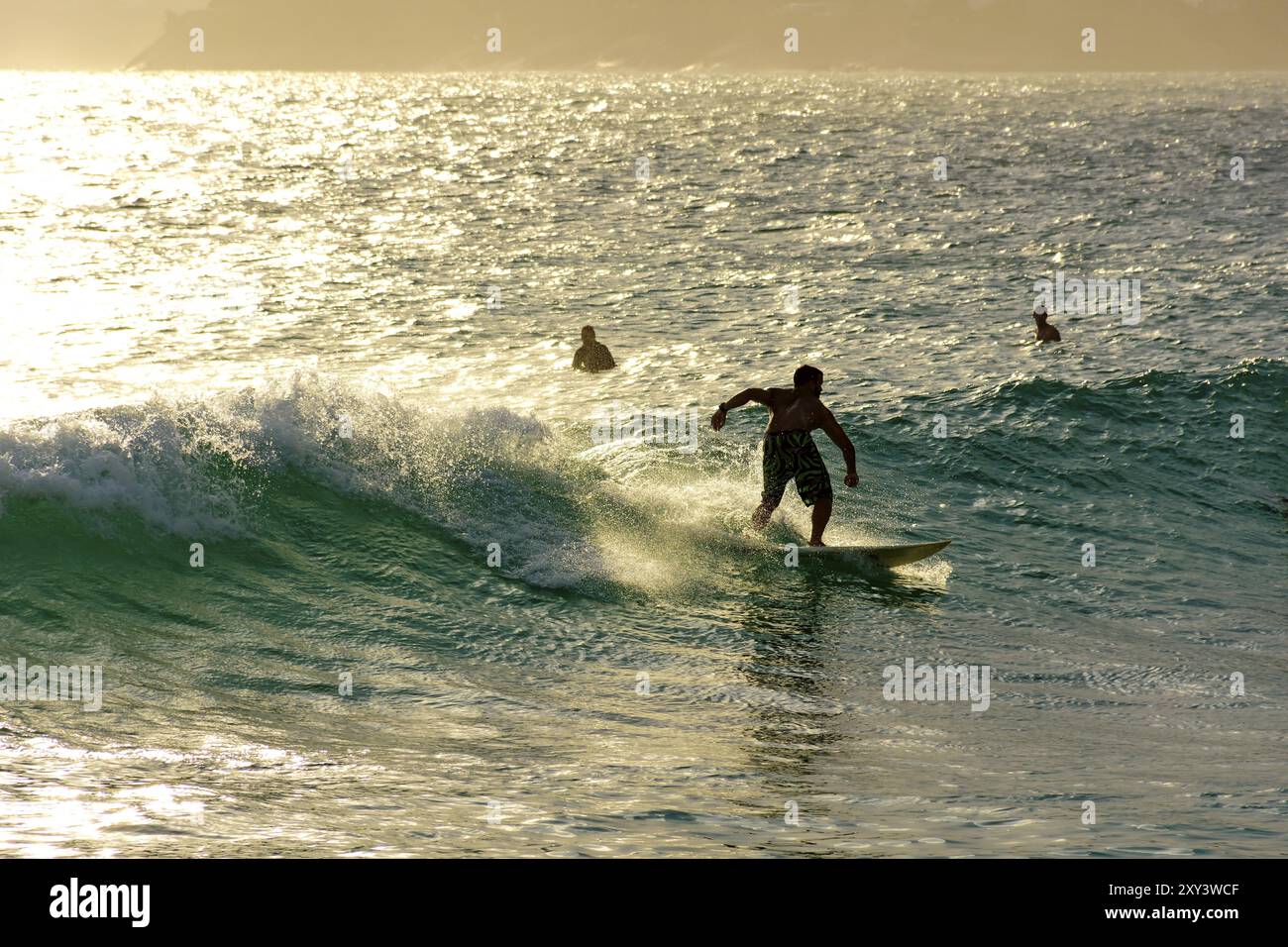 Surfing on Ipanema beach in Rio de Janeiro Stock Photo - Alamy