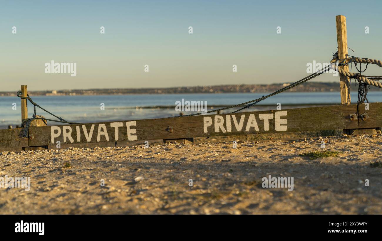 Sign: Private, seen at Shellness Beach on the Isle of Sheppey, Kent ...