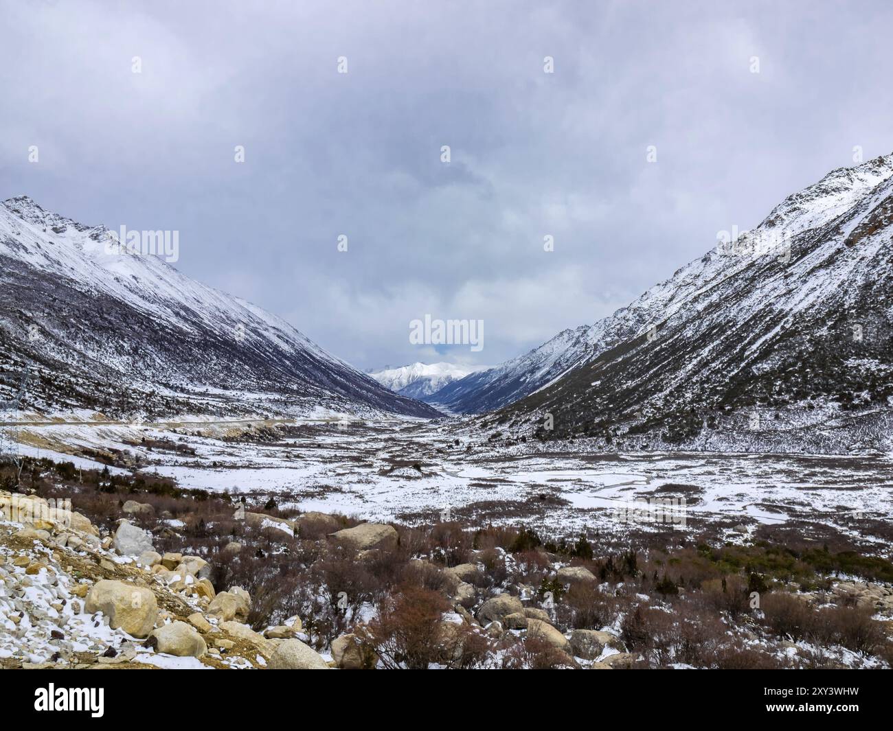 Winter snow covered the valley and the high mountain in Sichuan, China ...