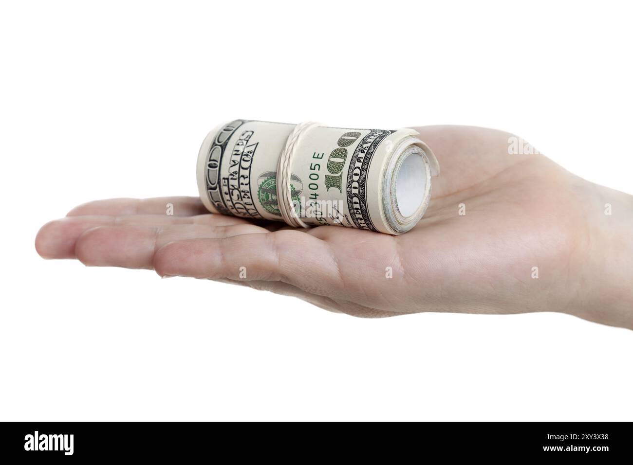 Human hand holding rolled up paper dollar currency Stock Photo - Alamy