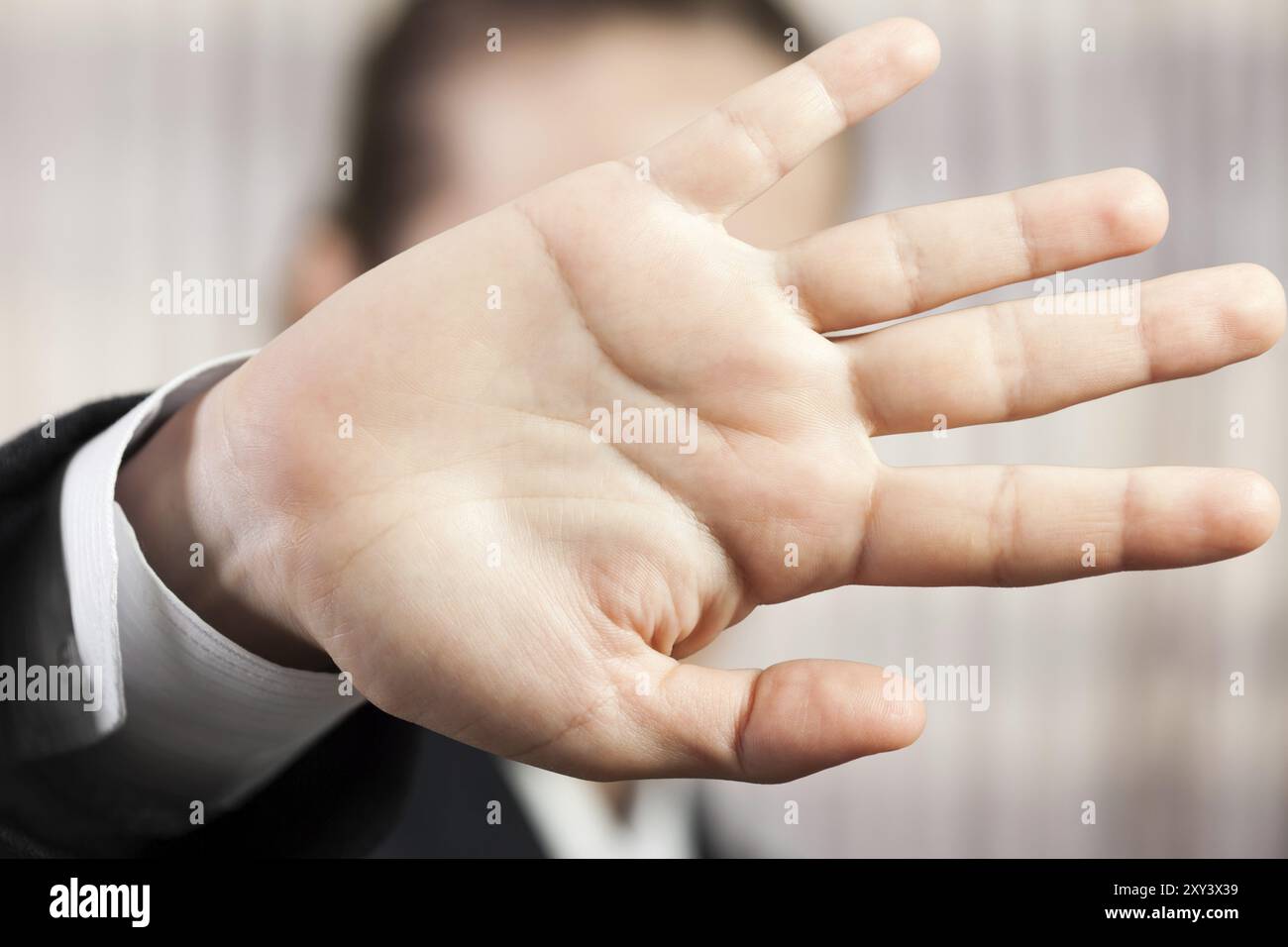 Shy business men hand gesture hide face stop sign Stock Photo - Alamy