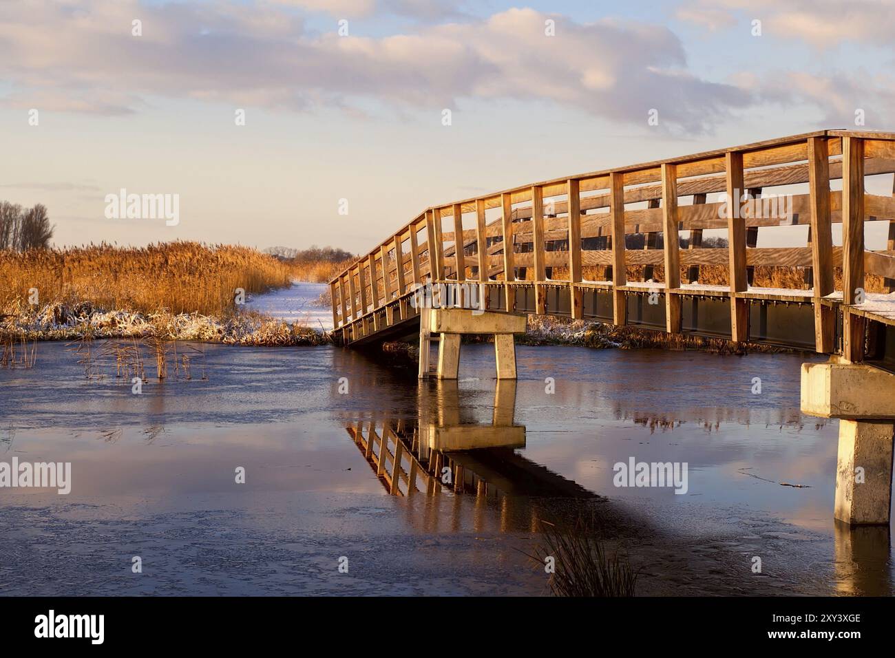 Sunrise over wooden bridge hi-res stock photography and images - Alamy