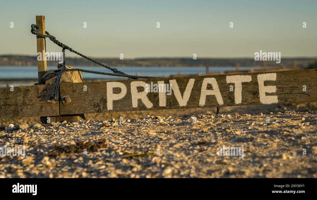 Sign: Private, seen at Shellness Beach on the Isle of Sheppey, Kent ...