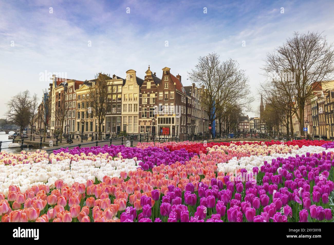 Amsterdam Netherlands, city skyline at canal waterfront and bridge with ...