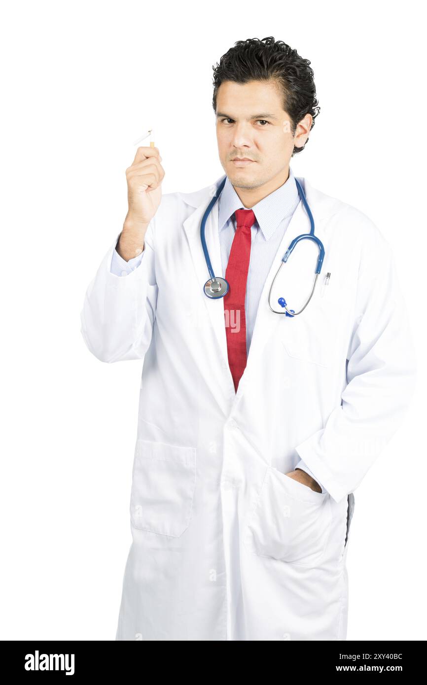 A latino doctor in lab coat, stethoscope stands with a stern facial ...