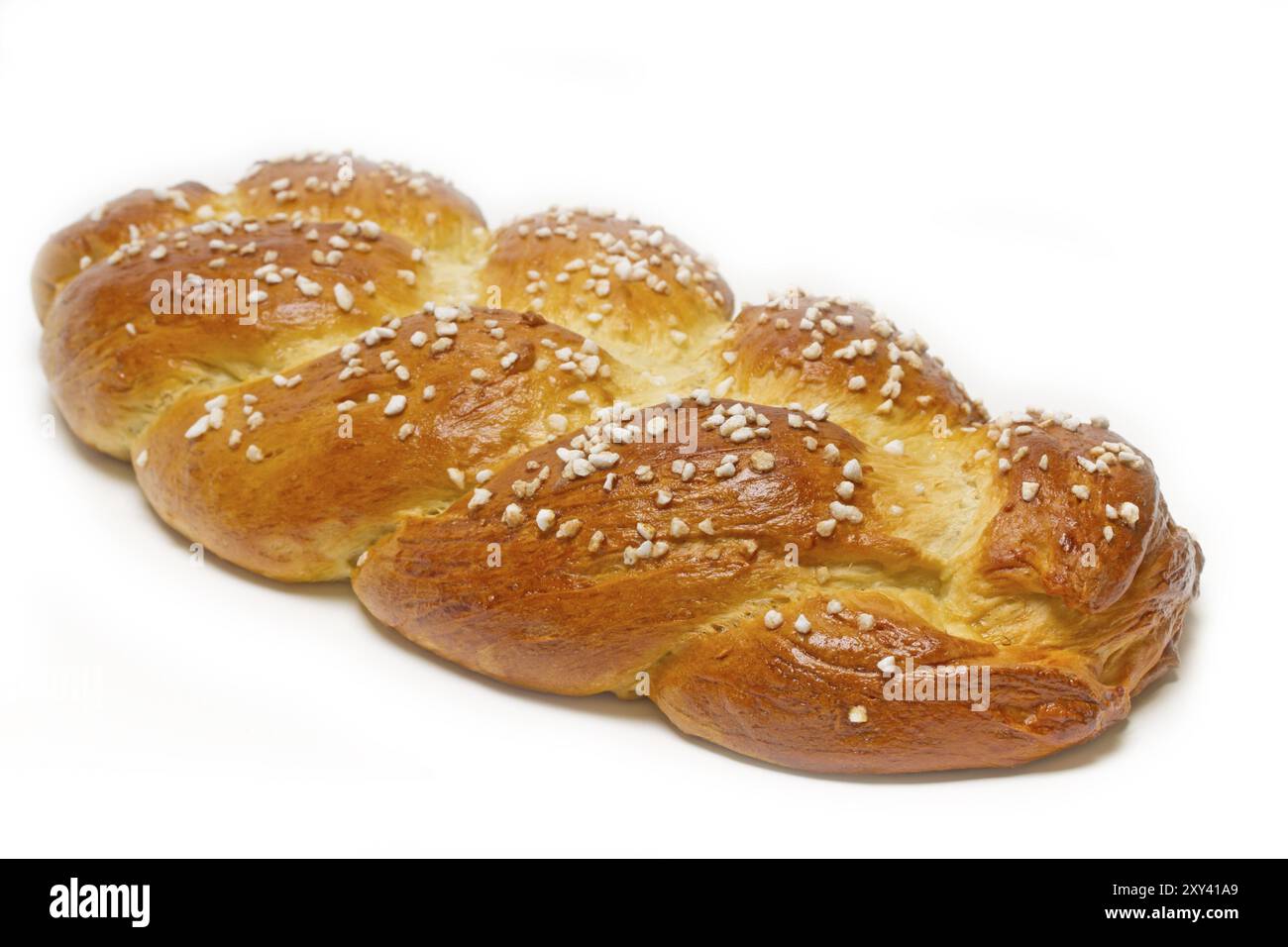 Home-baked yeast plait on a white background Stock Photo - Alamy