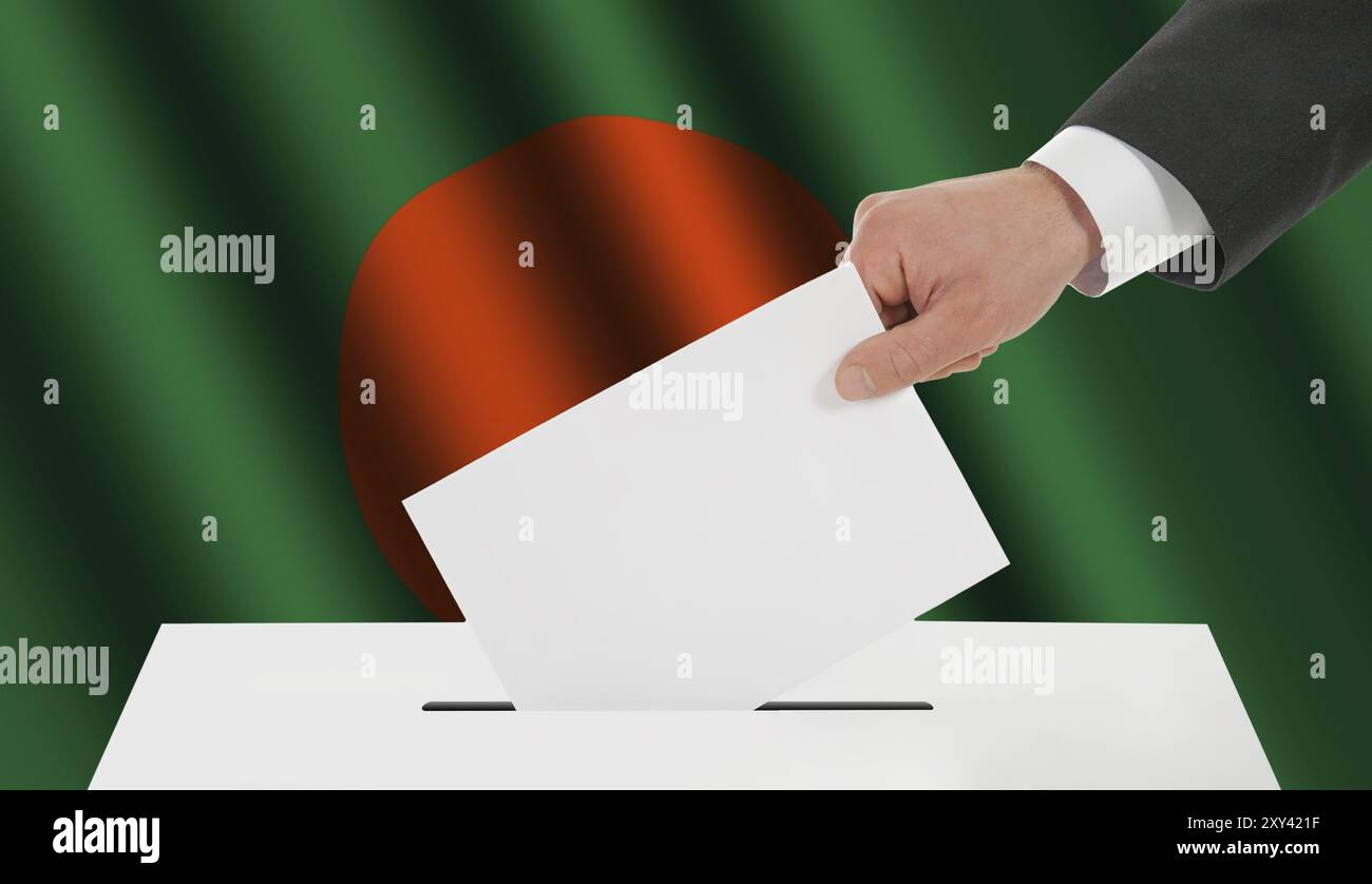 The Bangladesh flag and the hand with the bulletin about the ballot box ...