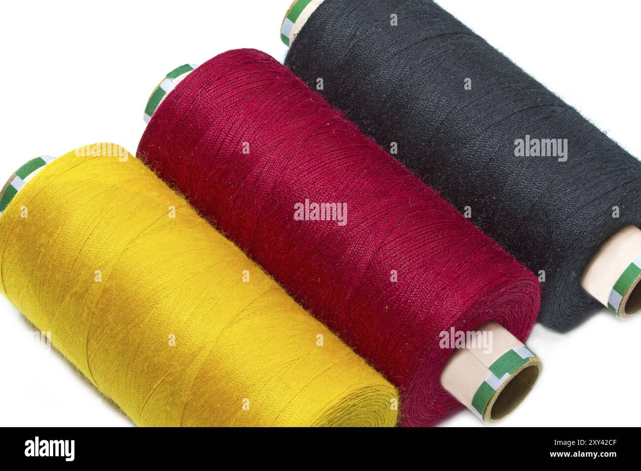 Thread spools in the German colours Stock Photo - Alamy