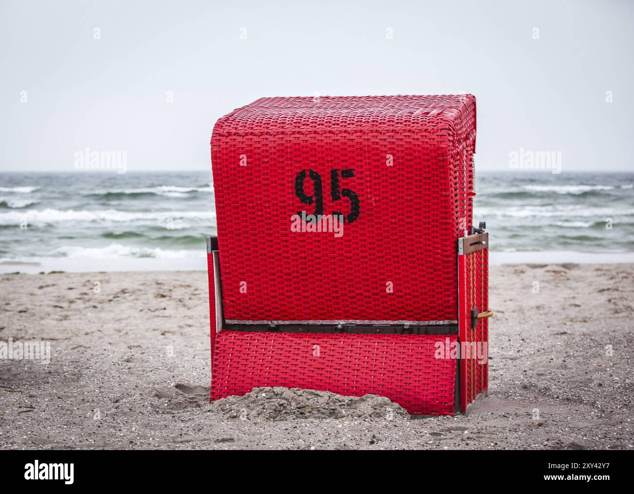 Red wicker beach chair hi-res stock photography and images - Alamy