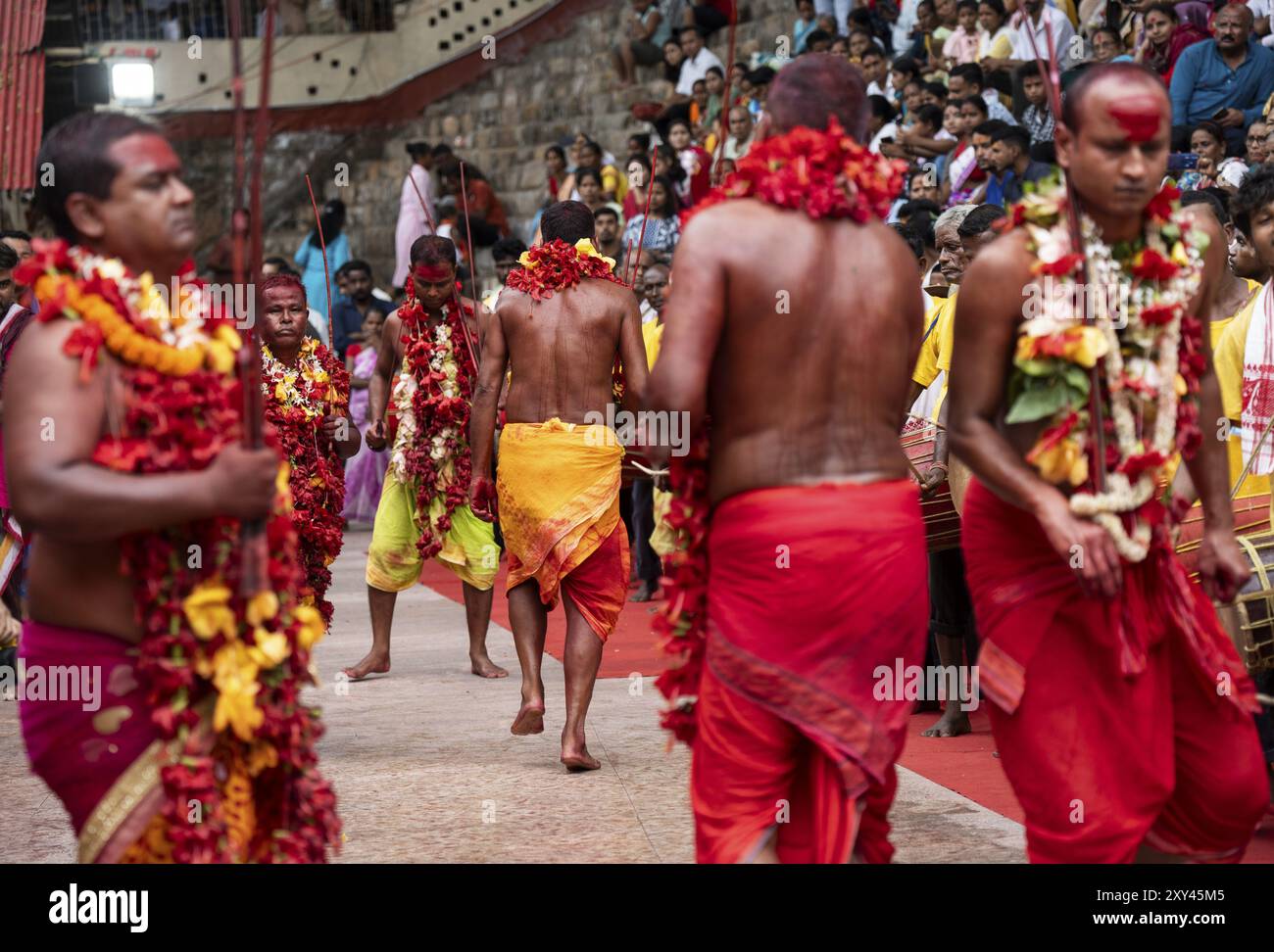 GUWAHATI, INDIA, AUGUST 19: Priests dance in the beat of Dhol (Drum ...