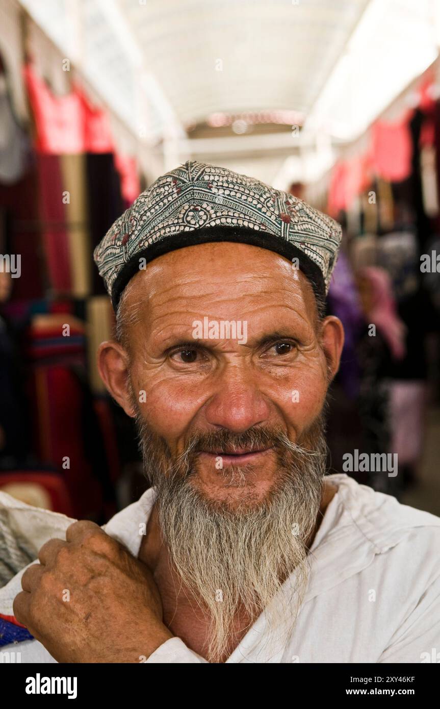 Portrait of an Uyghur man taken in the old city of Kashgar, Xinjiang ...