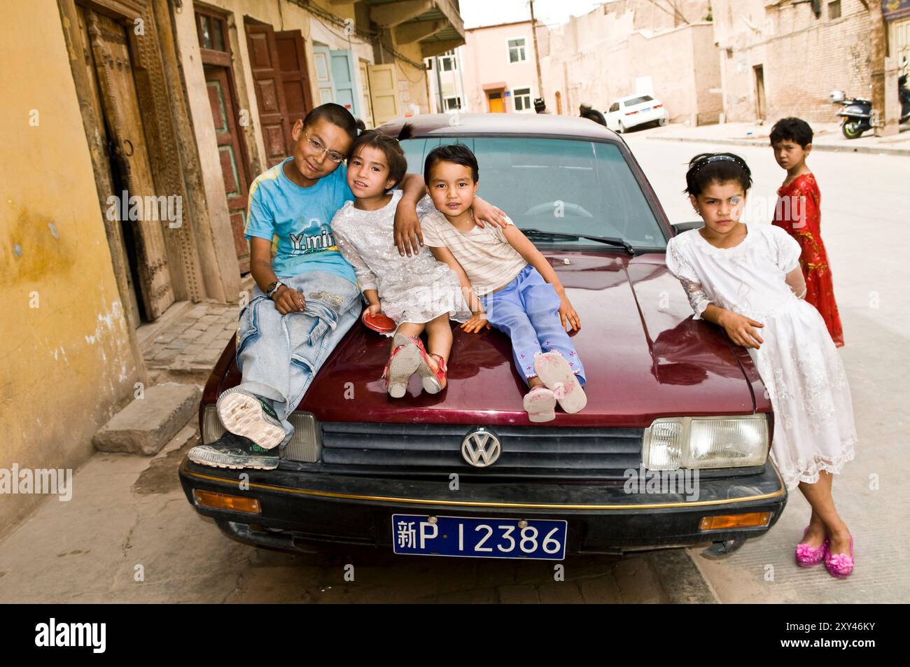 Uyghur children in the old city of Kashgar, Xinjiang, China Stock Photo ...