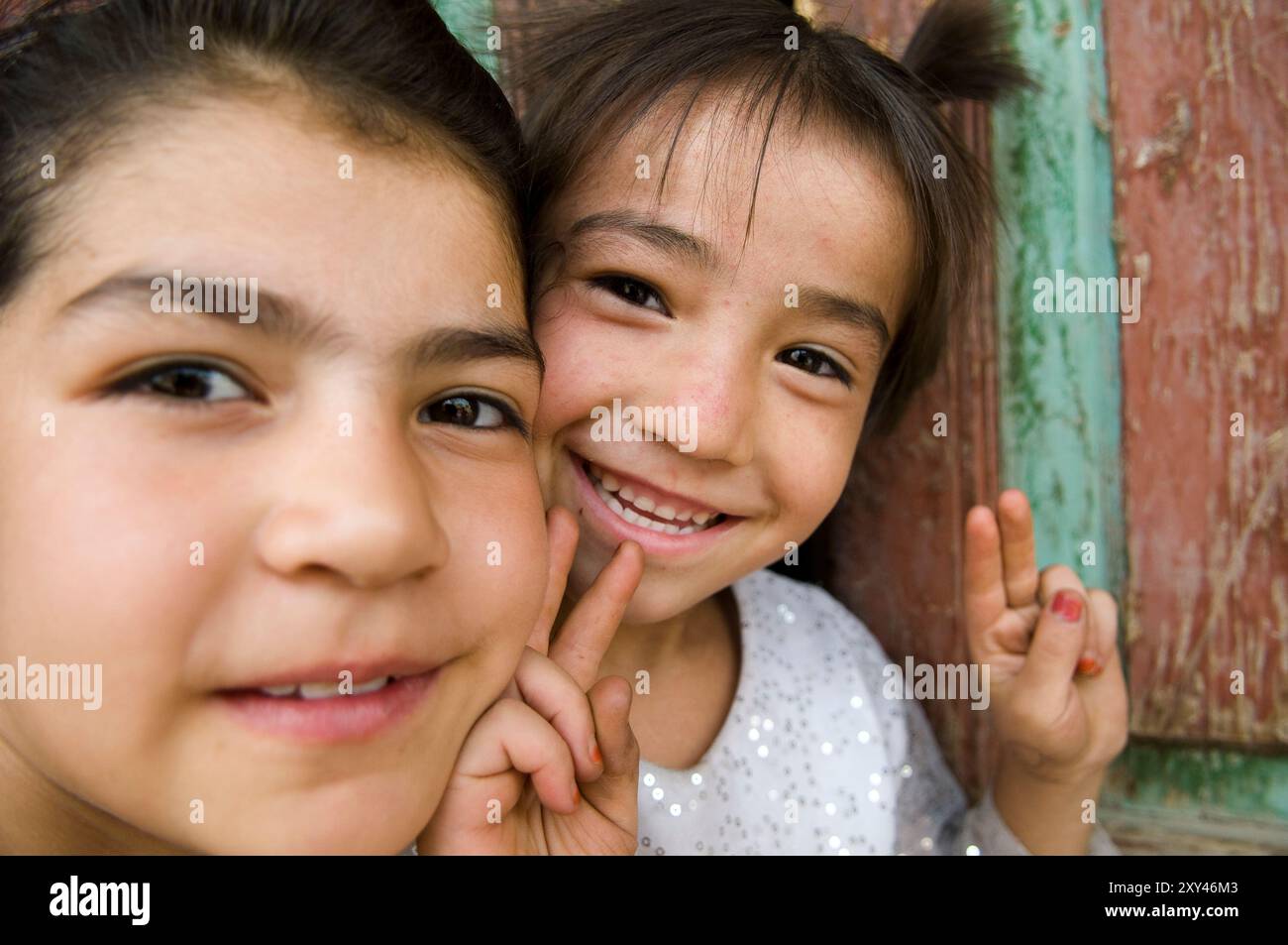 Uyghur children in the old city of Kashgar, Xinjiang, China Stock Photo ...