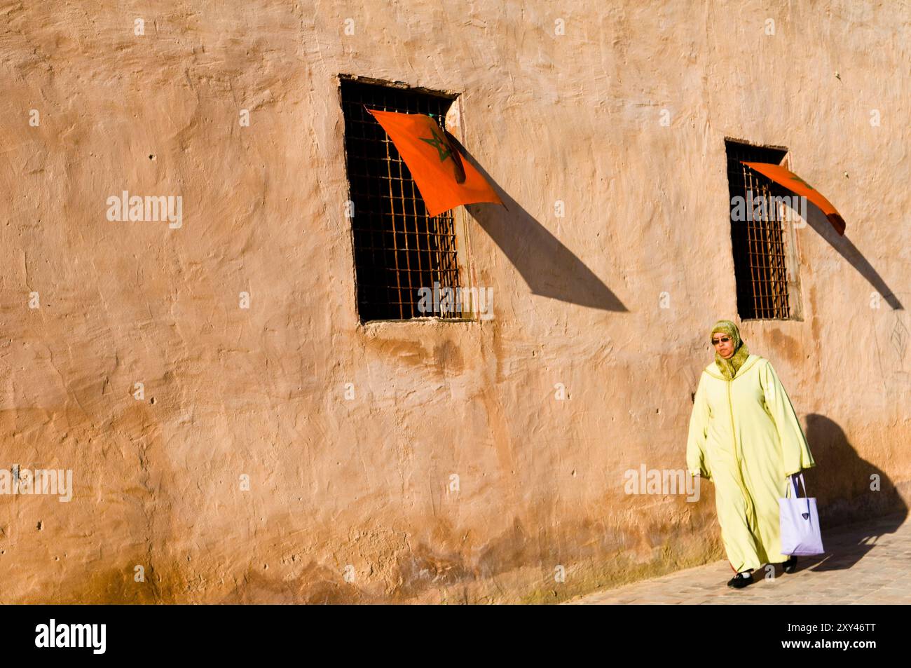 A Moroccan woman walking in the old medina of Meknes, Morocco Stock ...