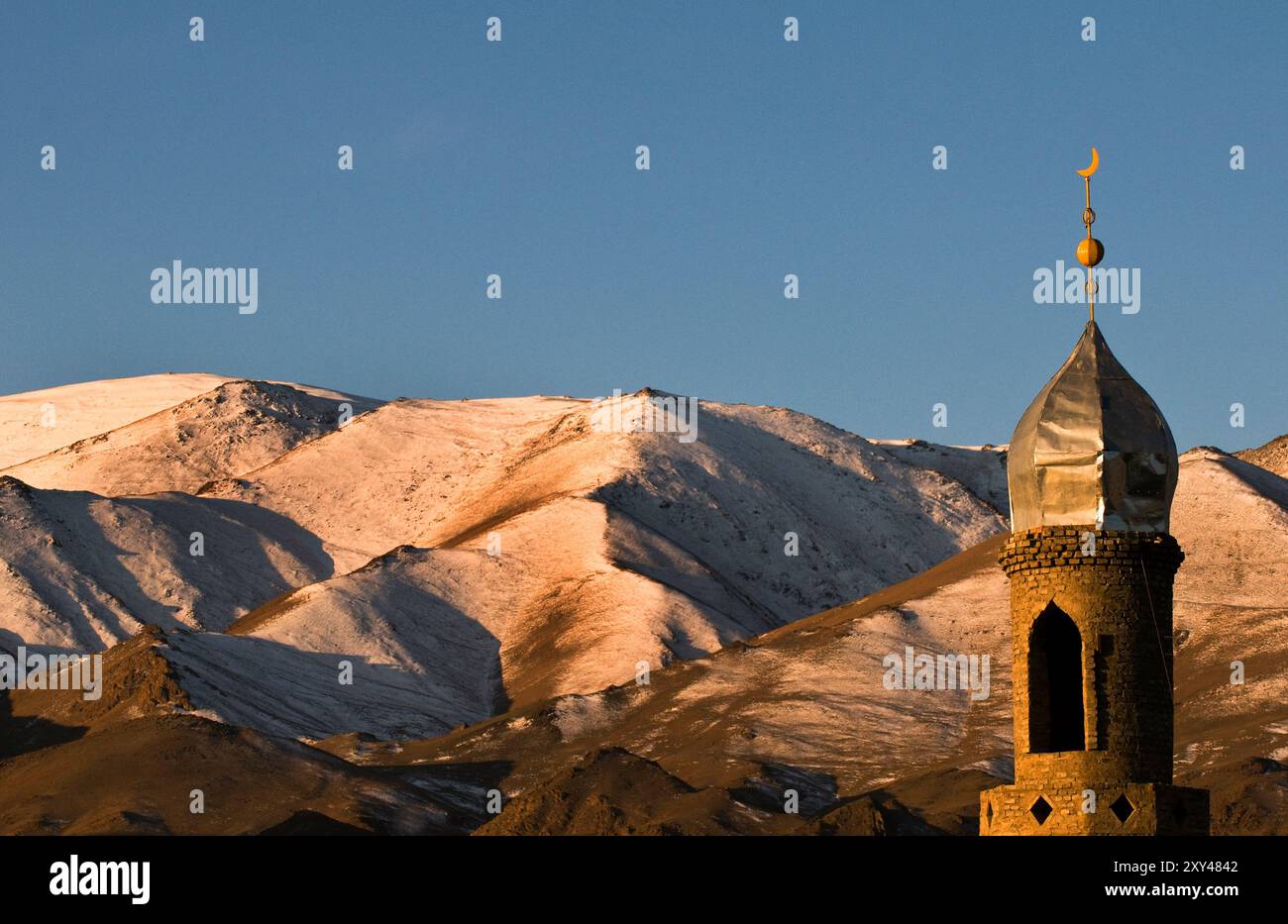 A minaret of a mosque in Bayan-Ölgii in western Mongolia Stock Photo ...