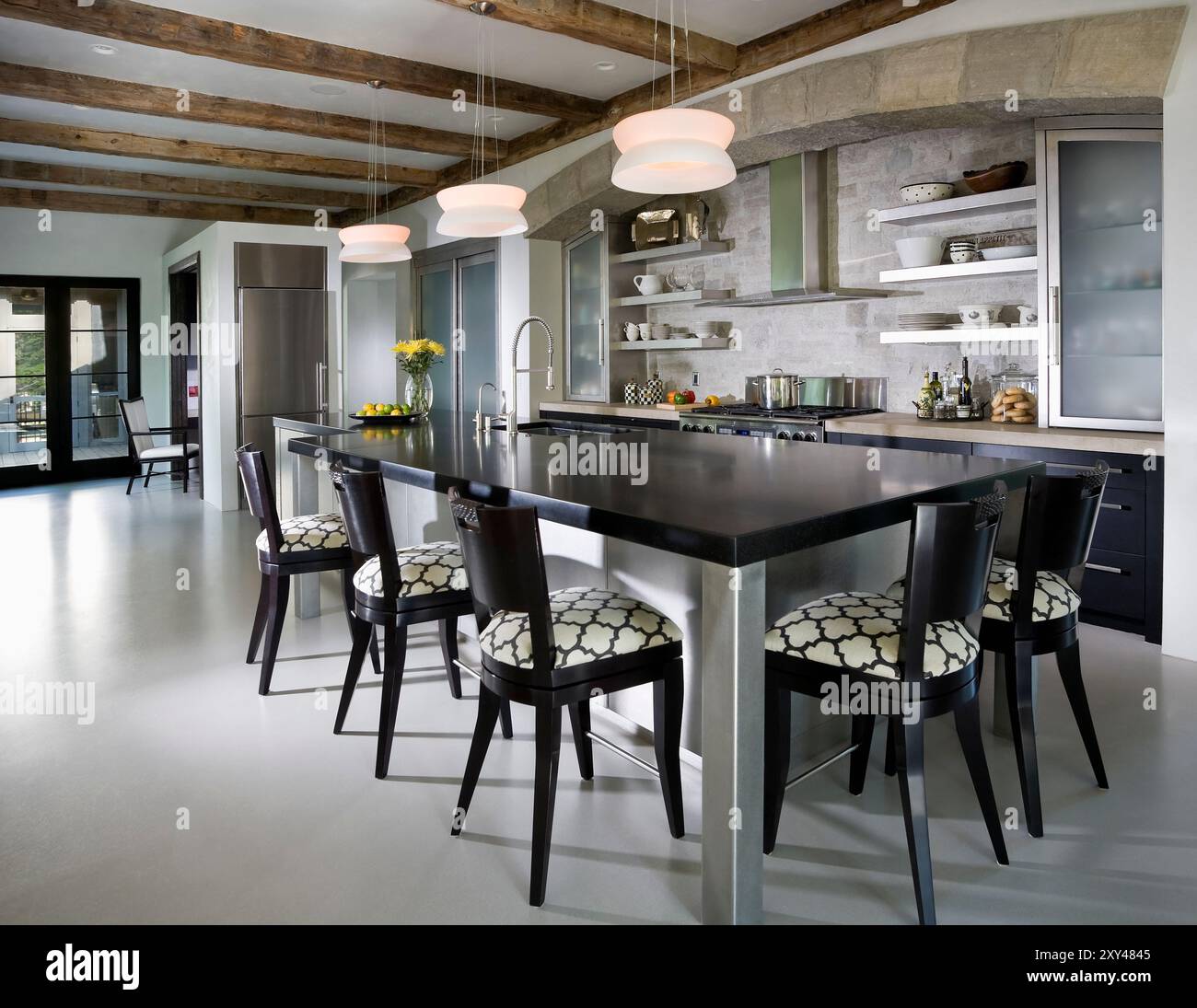 Recessed alcove contains stove and backsplash and shelving hi-res stock ...