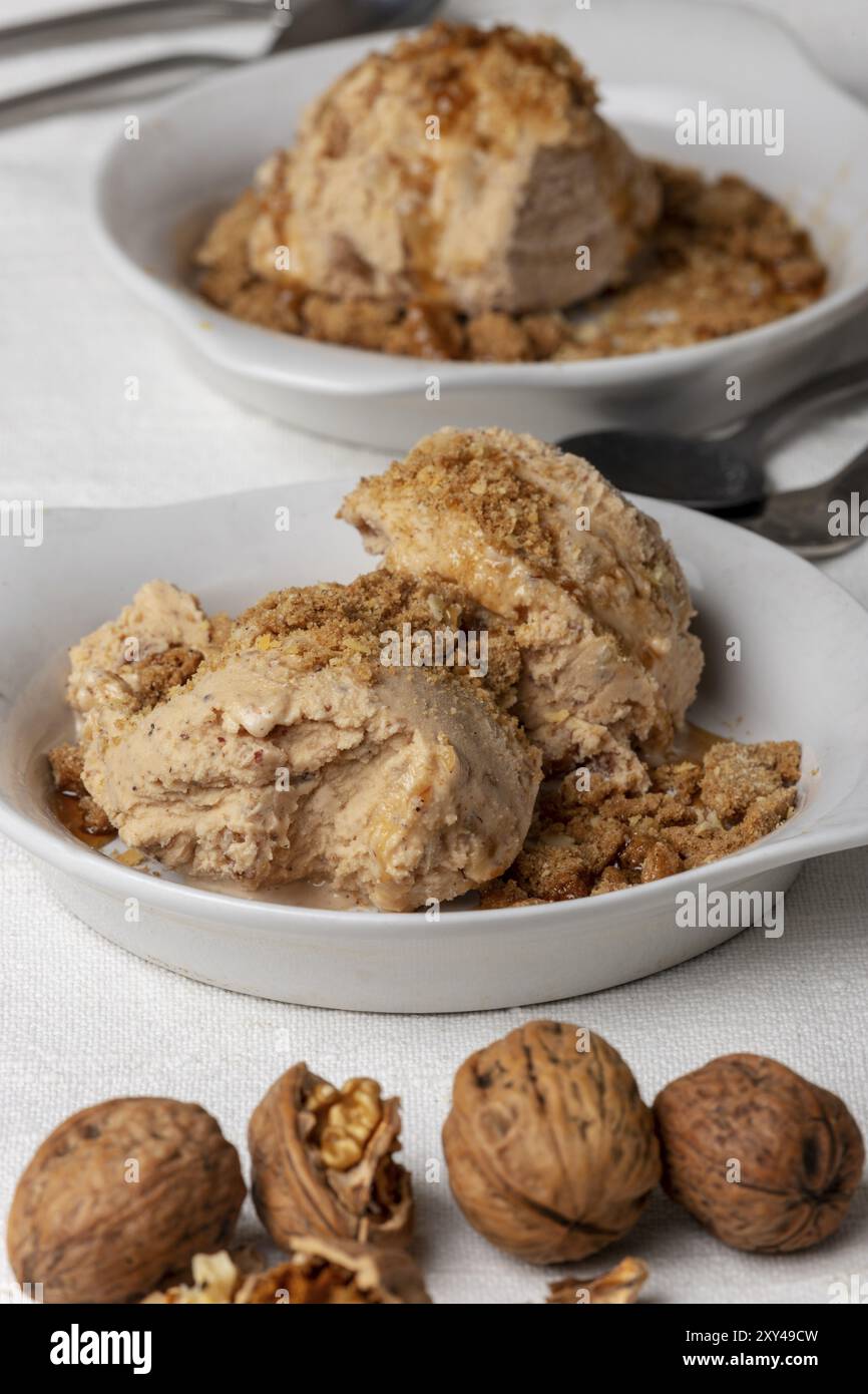Two portions of walnut ice cream Stock Photo - Alamy