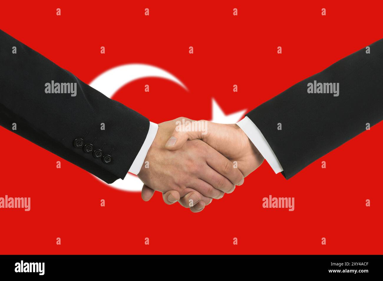 The Turkish flag and business handshake Stock Photo - Alamy