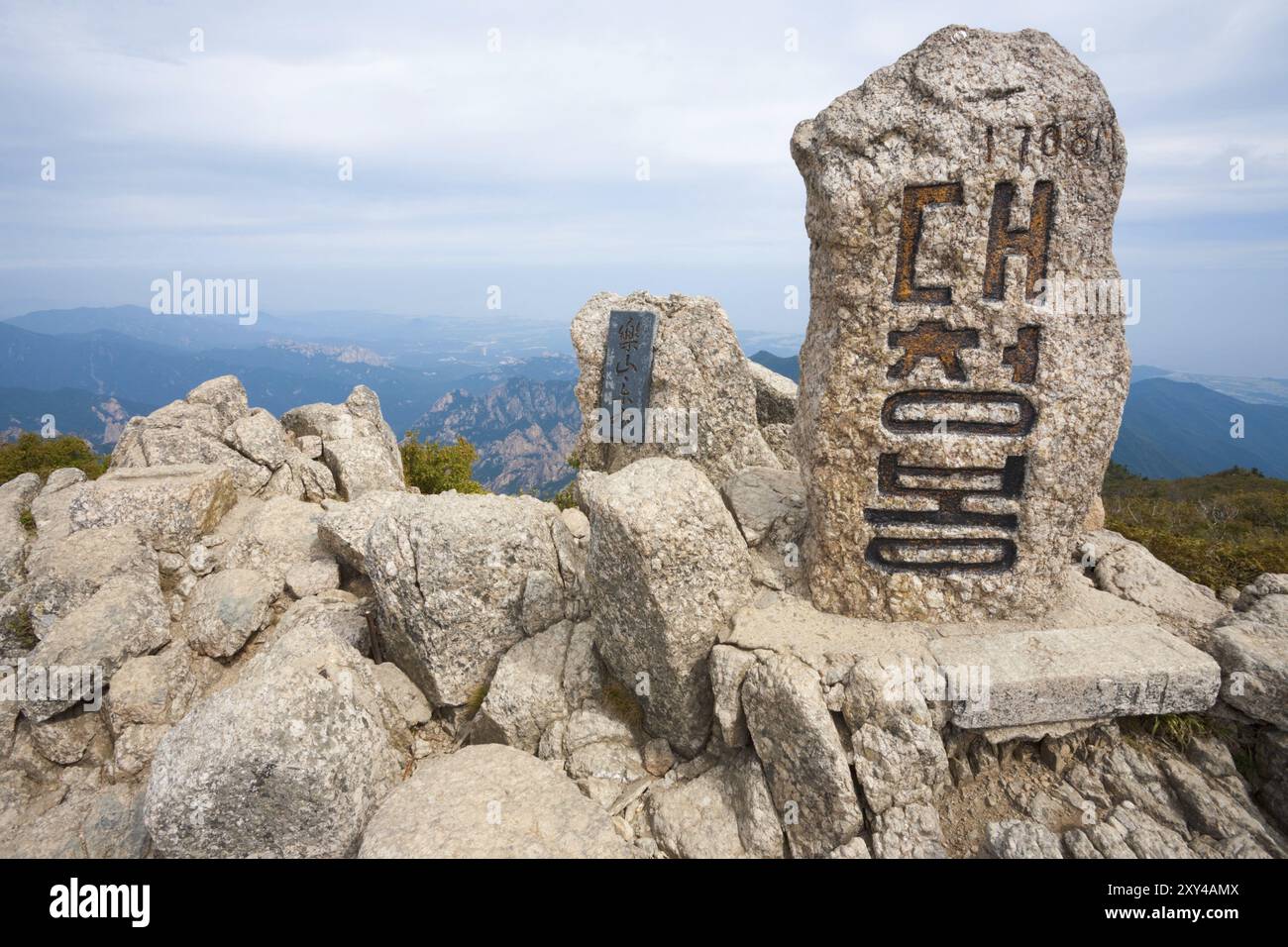 The highest point of Seoraksan mountain and of South Korea is marked by ...