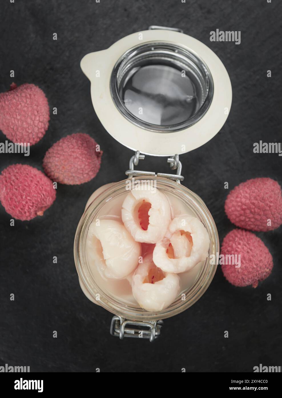Fresh made Lychees (preserved) on a vintage background (close-up shot ...