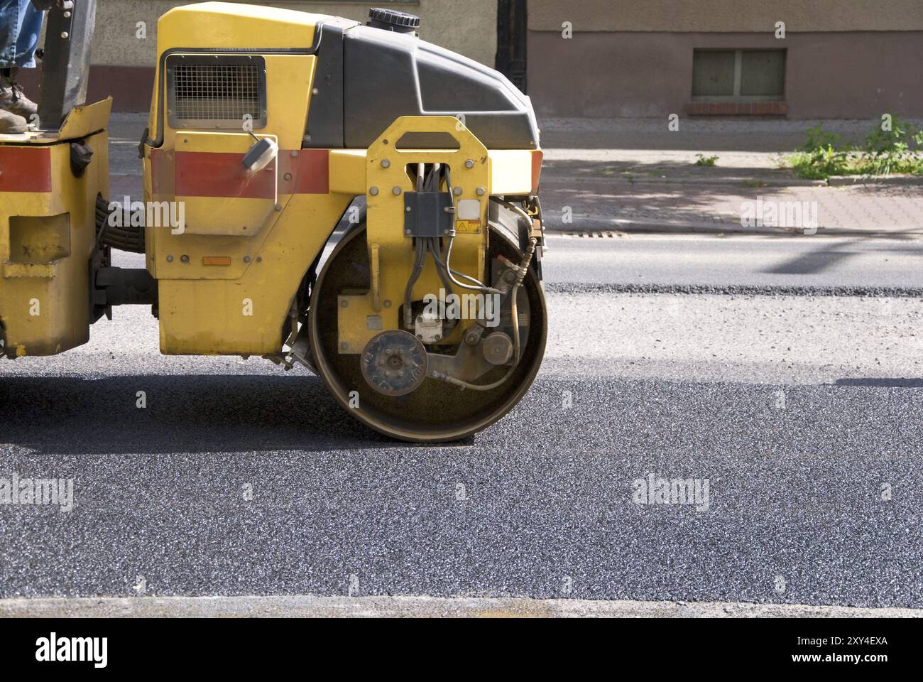 Road roller on bitumen road Stock Photo - Alamy