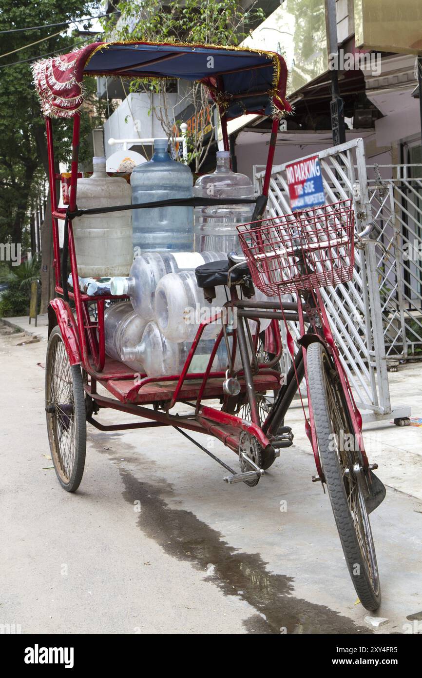 Rickshaw loaded with water bottles, India, Asia Stock Photo - Alamy