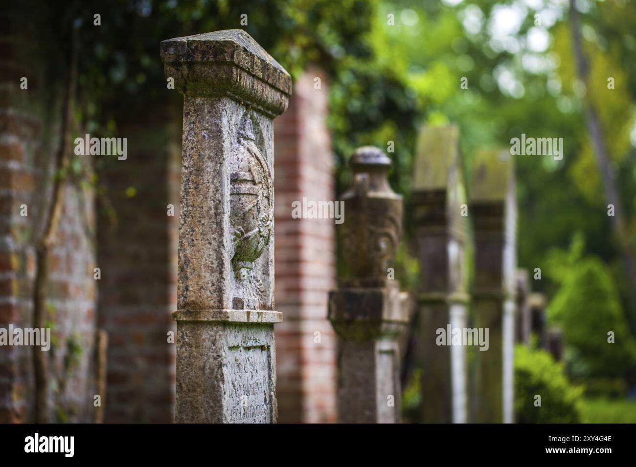 Old gravestone with carvings Stock Photo - Alamy