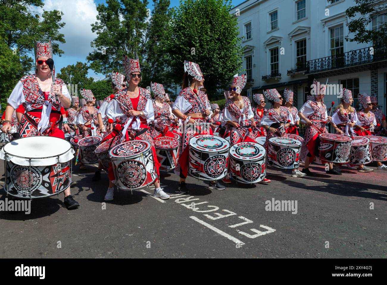 Batala Mundo drummers at Notting Hill Carnival Grand Parade 2024. Adult ...