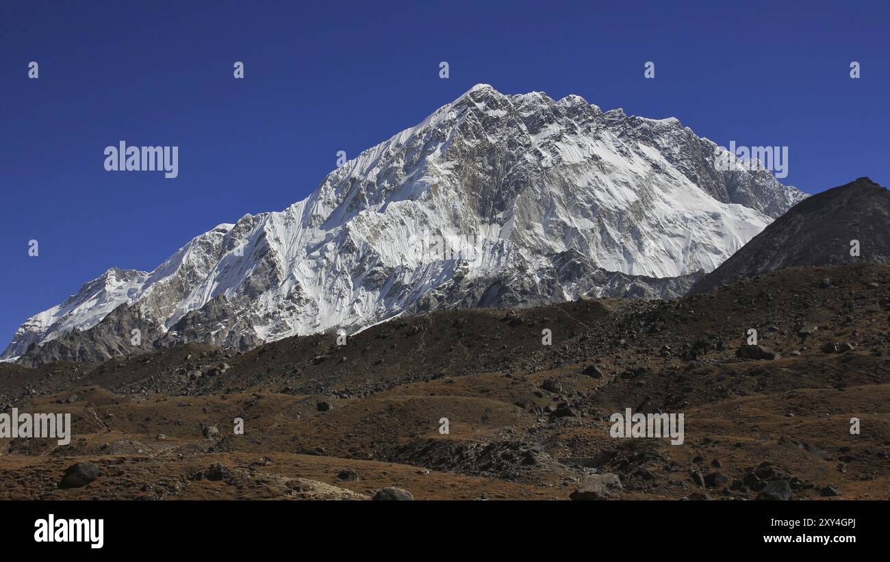 Scene on the way to the Everest base camp. Mount Nuptse, high mountain ...