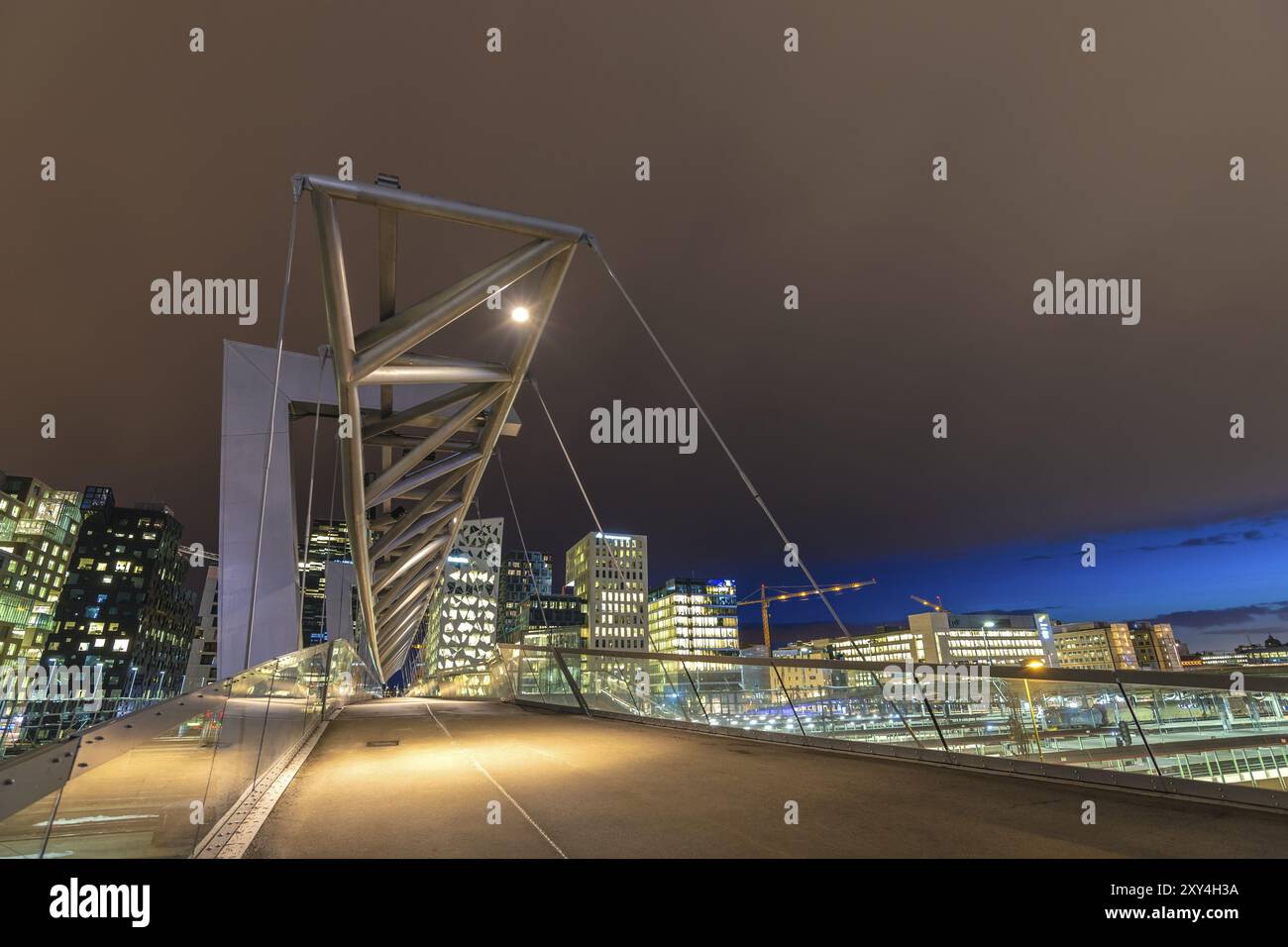 Oslo city skyline at Akrobaten pedestrian bridge and Bercode Project ...