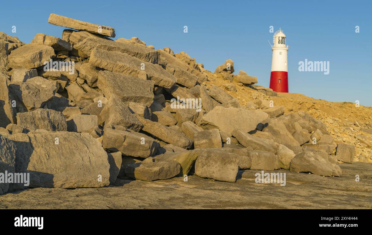 Portland Bill Lighthouse seen from the rocks near Pulpit Rock, Jurassic ...